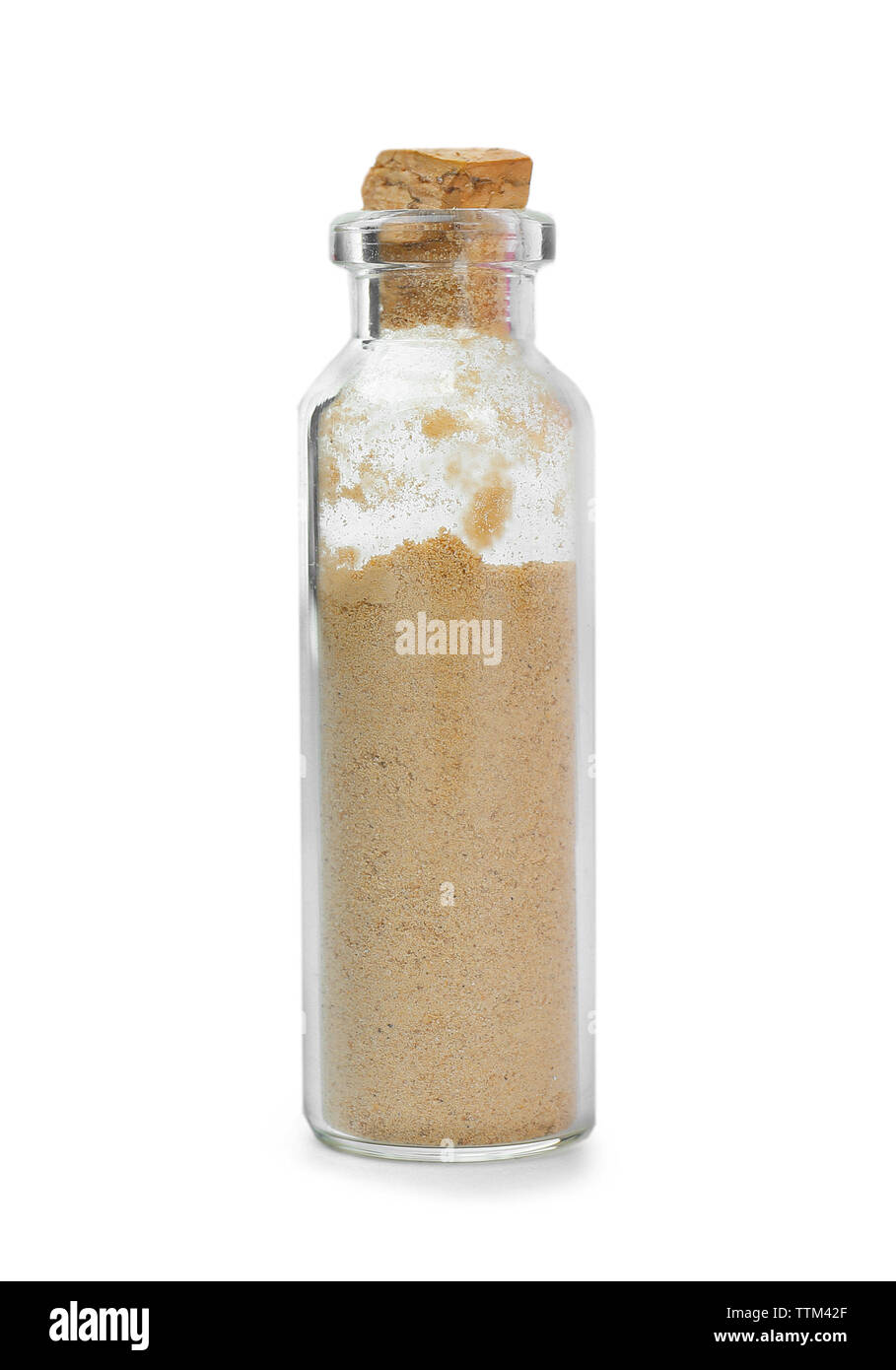 Powdered ginger in glass bottle on white background Stock Photo - Alamy