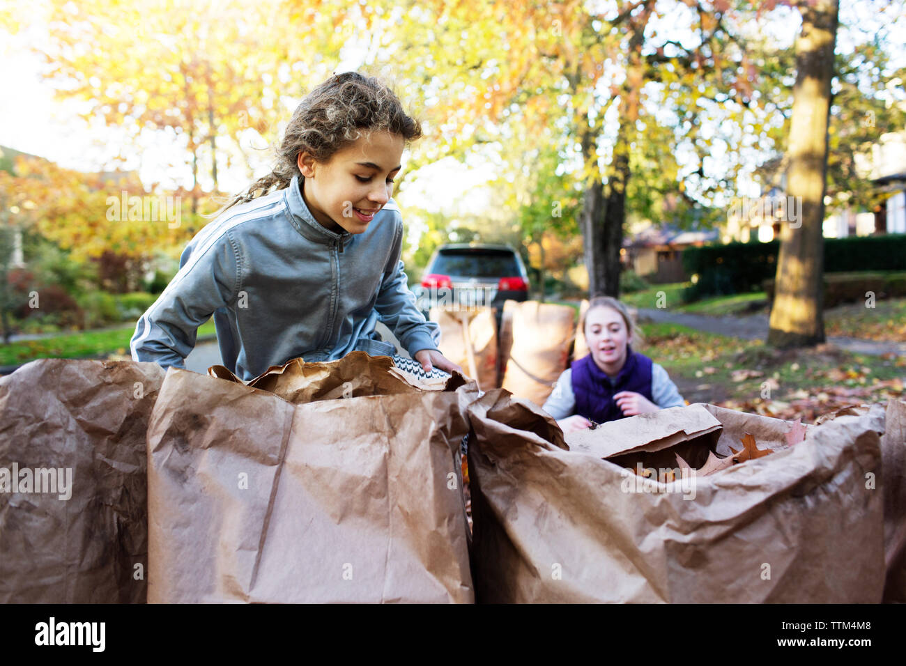 Collecting leaves hi-res stock photography and images - Alamy
