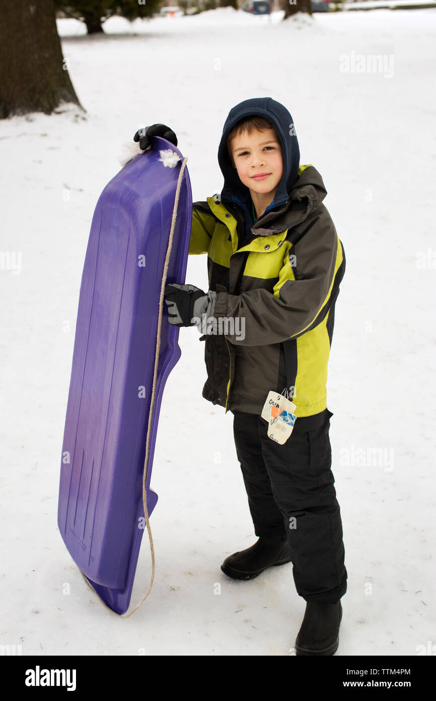 Boy sledge hi-res stock photography and images - Alamy