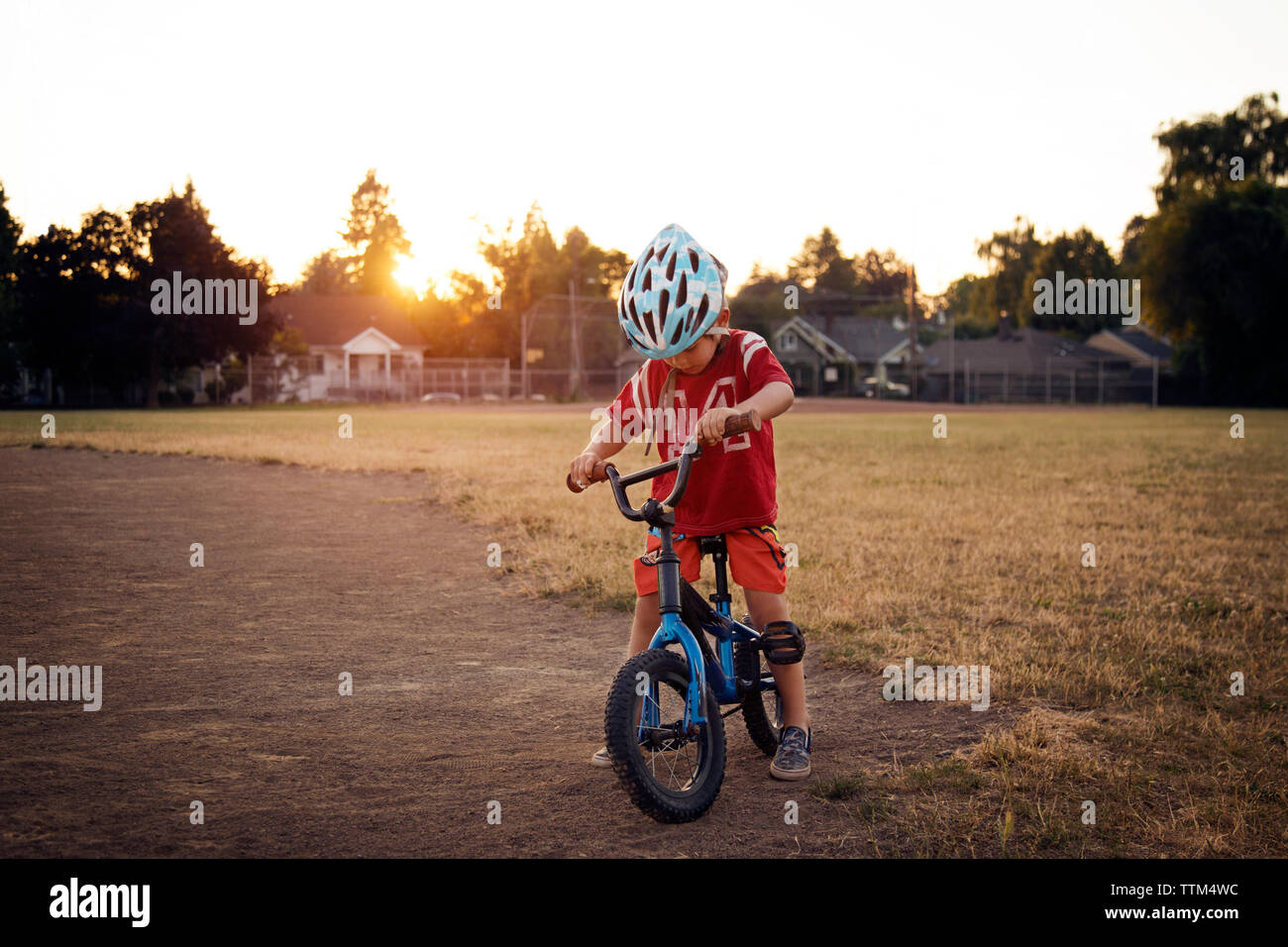 Boy on bicycle Stock Photo - Alamy