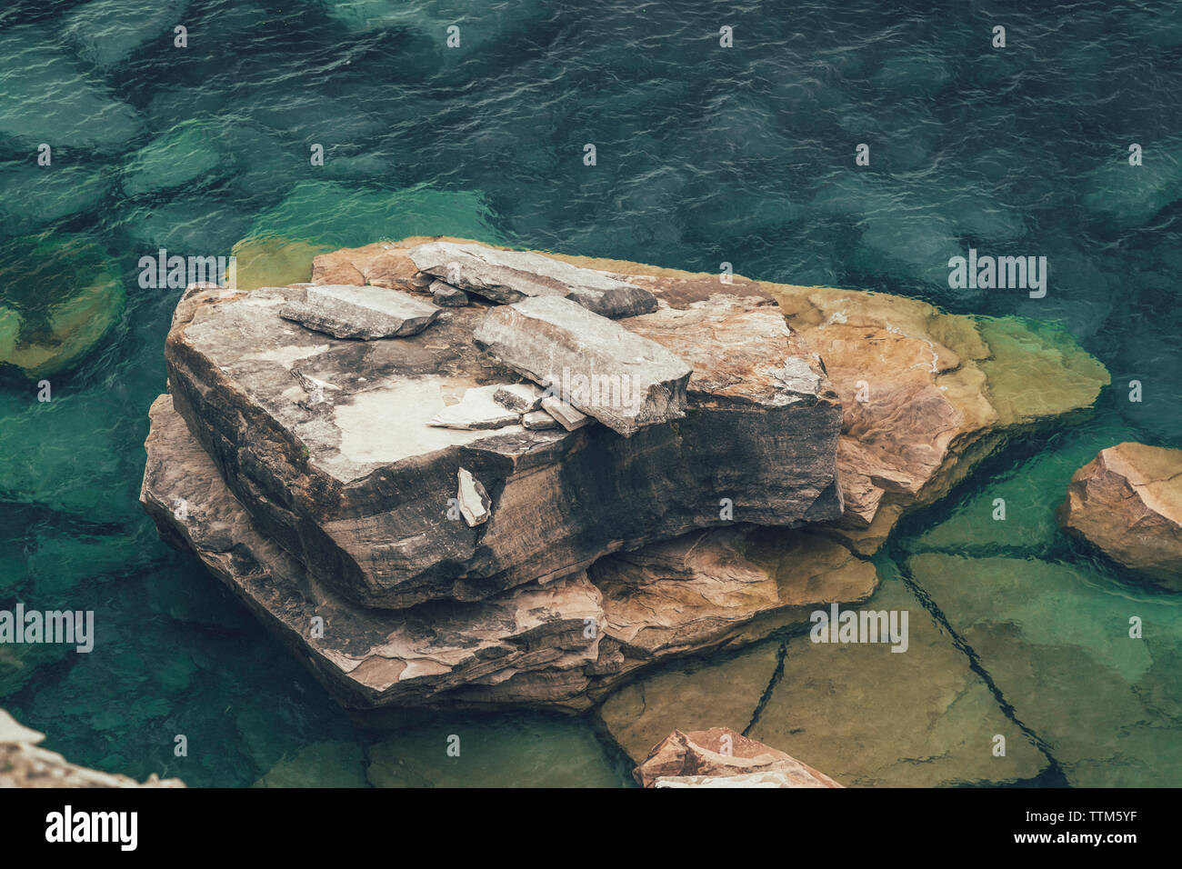 High angle view of rock formation on sea Stock Photo - Alamy