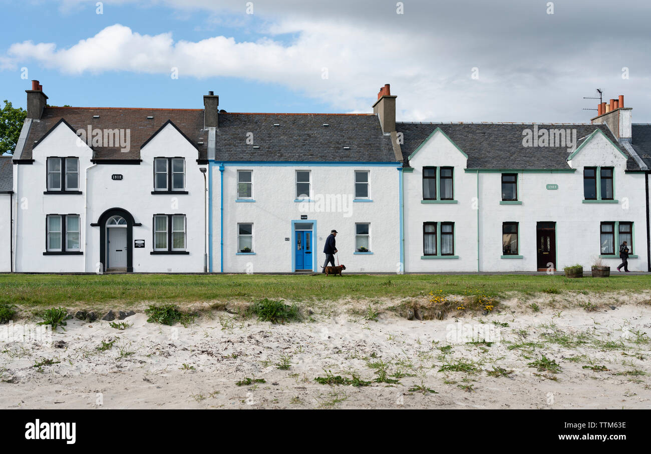View of whitewashed houses at Port Ellen on Islay in Inner Hebrides ...