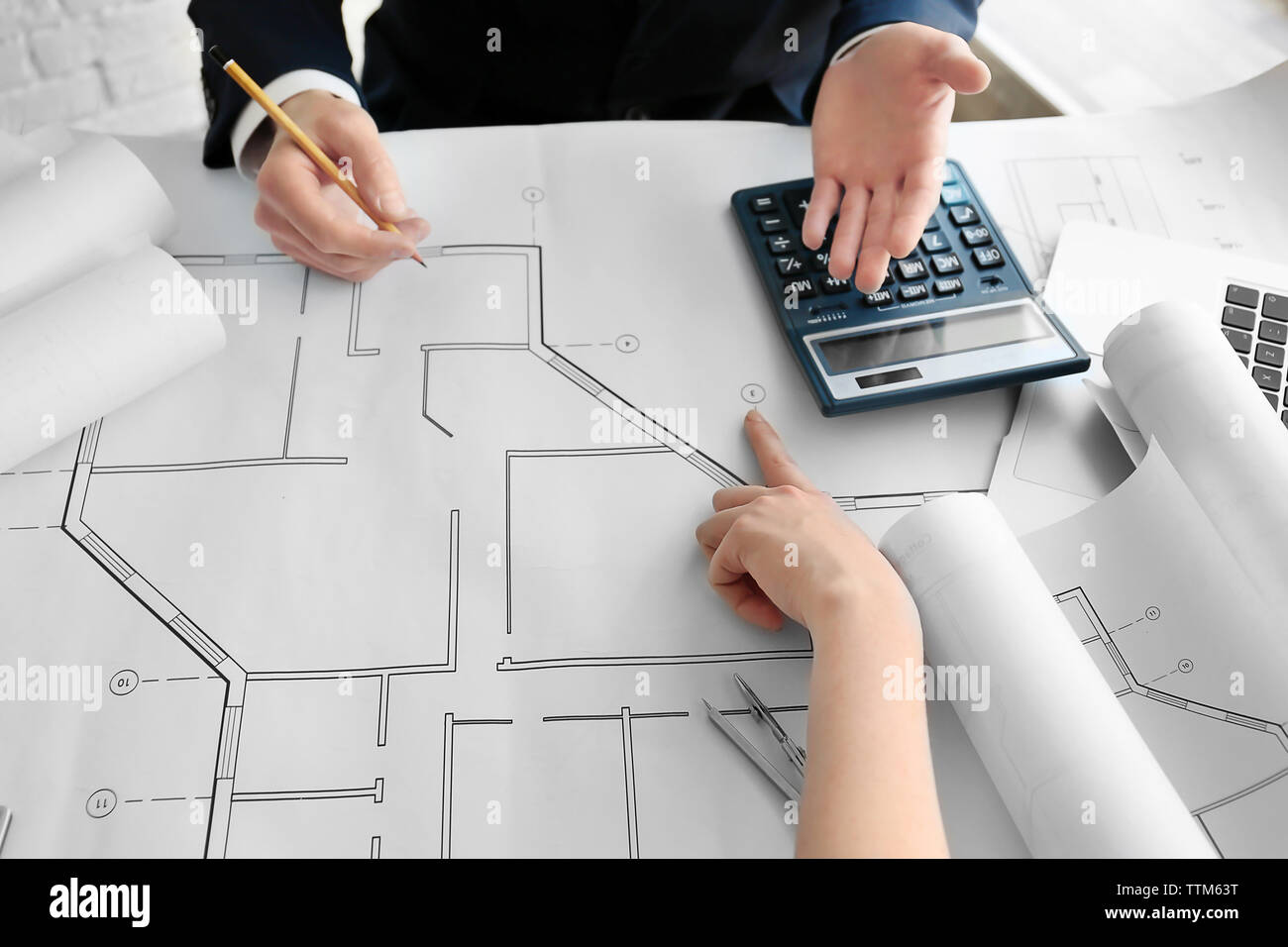 Woman engineer builder blueprint calculator hi-res stock photography ...