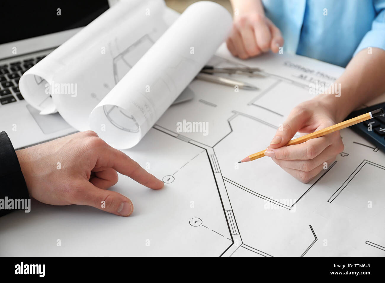 Woman engineer builder blueprint calculator hi-res stock photography ...