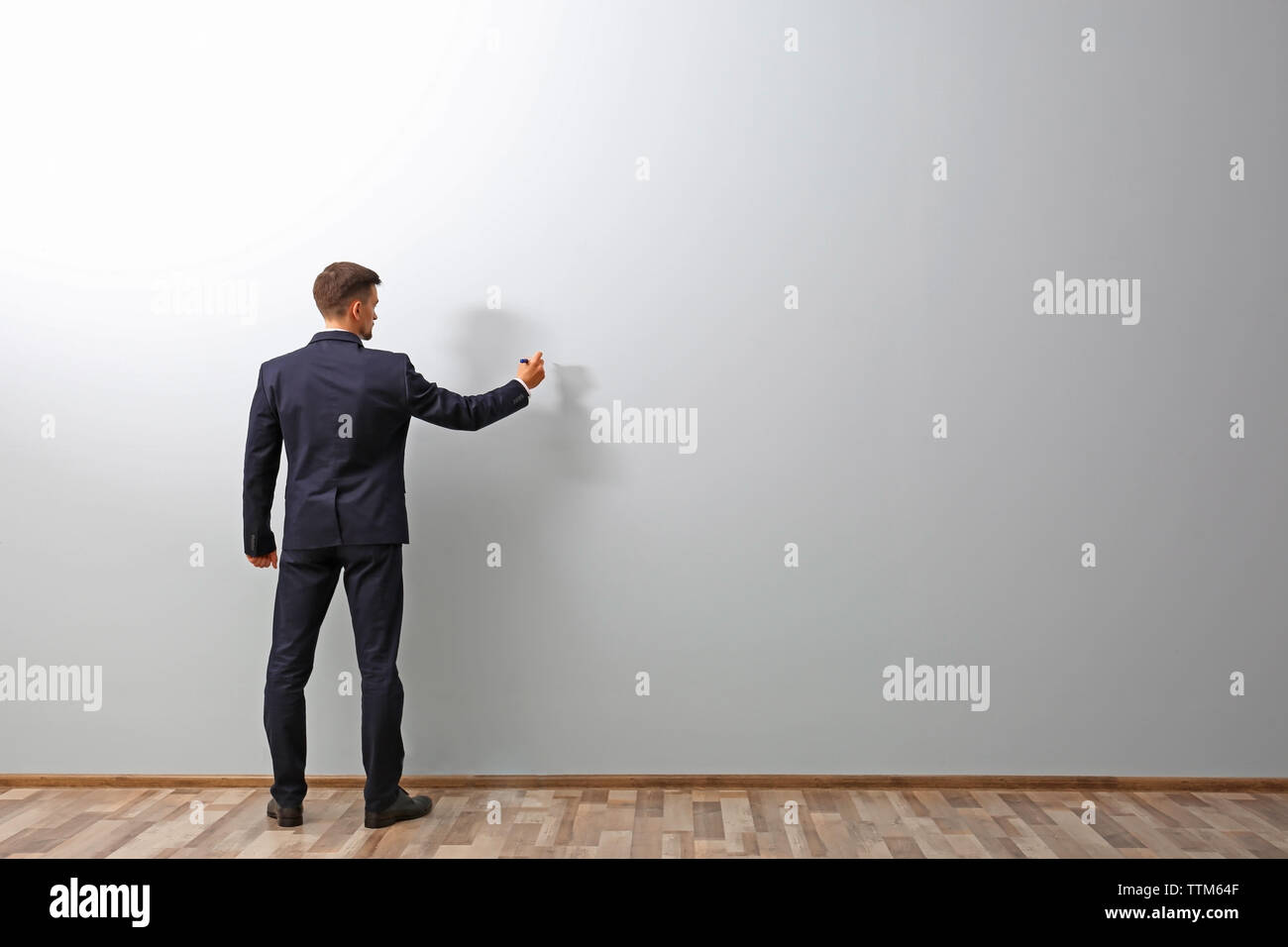Person Writing On Wall