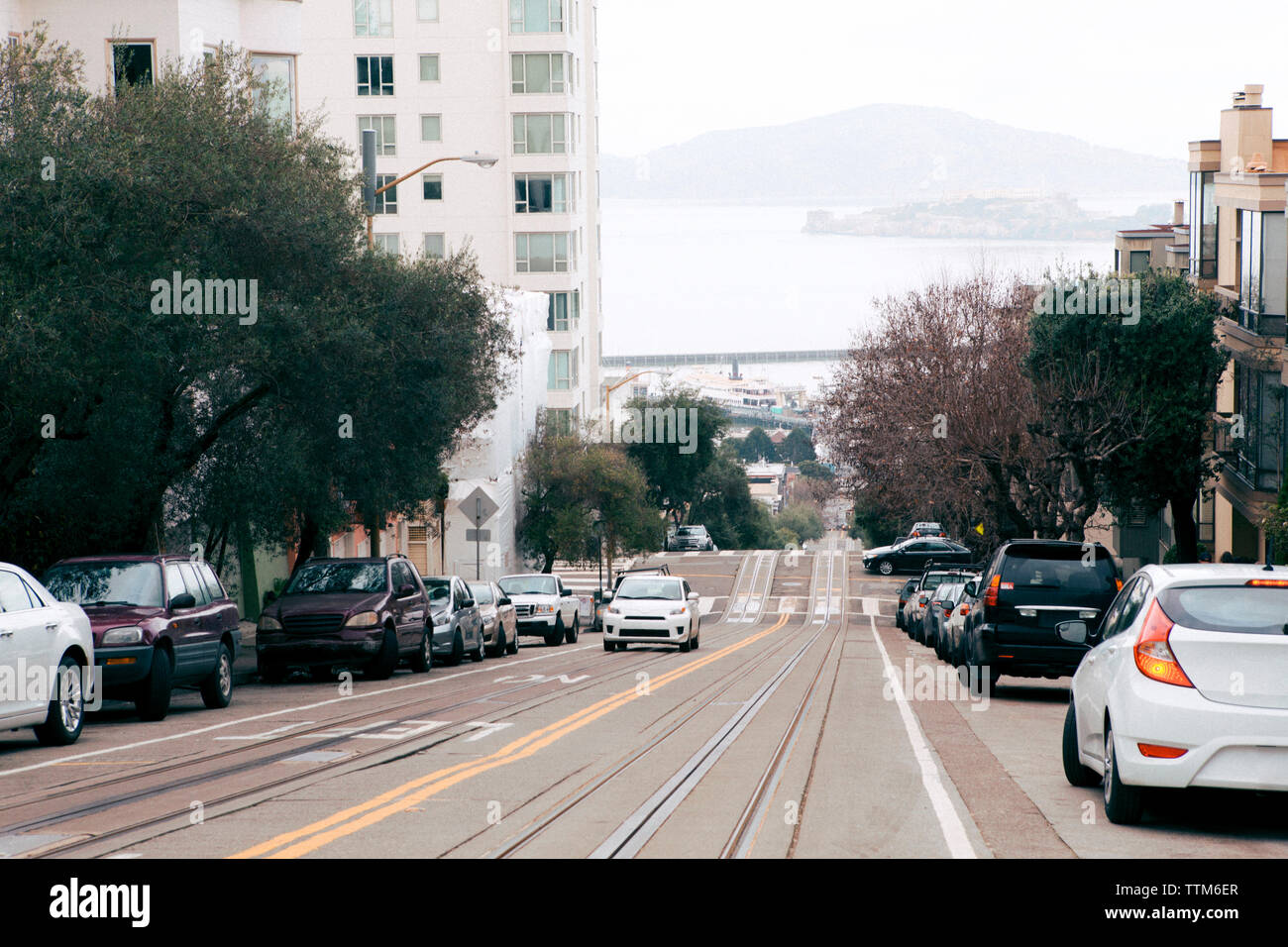Cars on road in city Stock Photo - Alamy