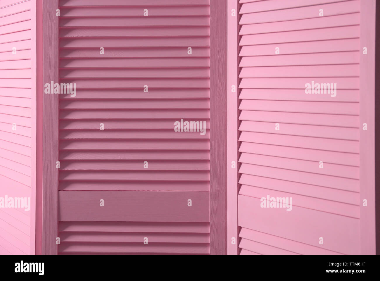 Pink folding screen, closeup Stock Photo - Alamy