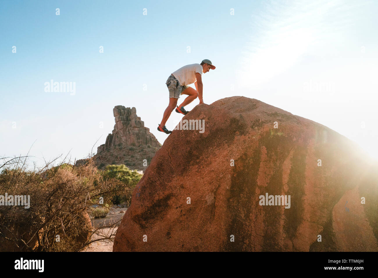 Man climbing rocks hi-res stock photography and images - Alamy
