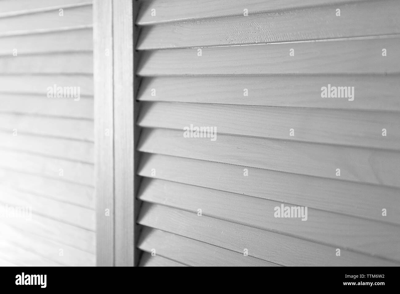 Grey folding screen, closeup Stock Photo - Alamy