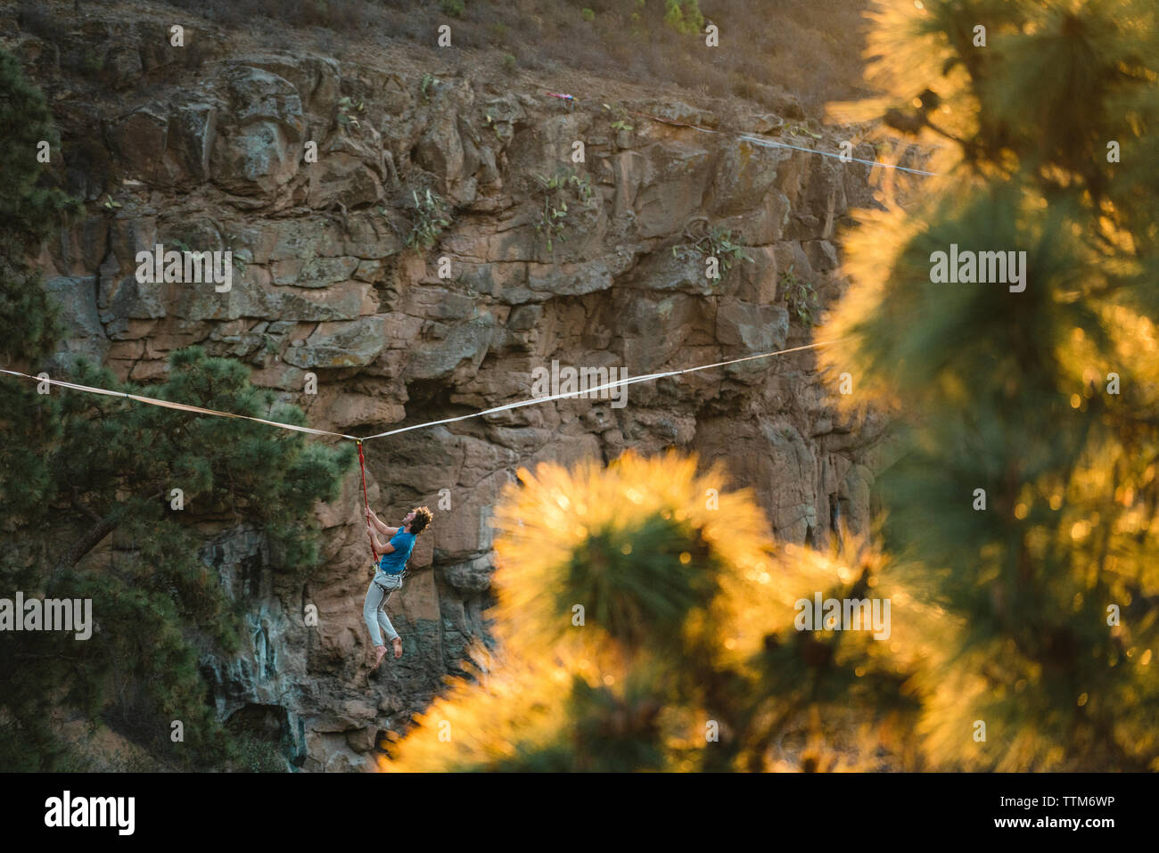Man hanging on hi-res stock photography and images - Alamy
