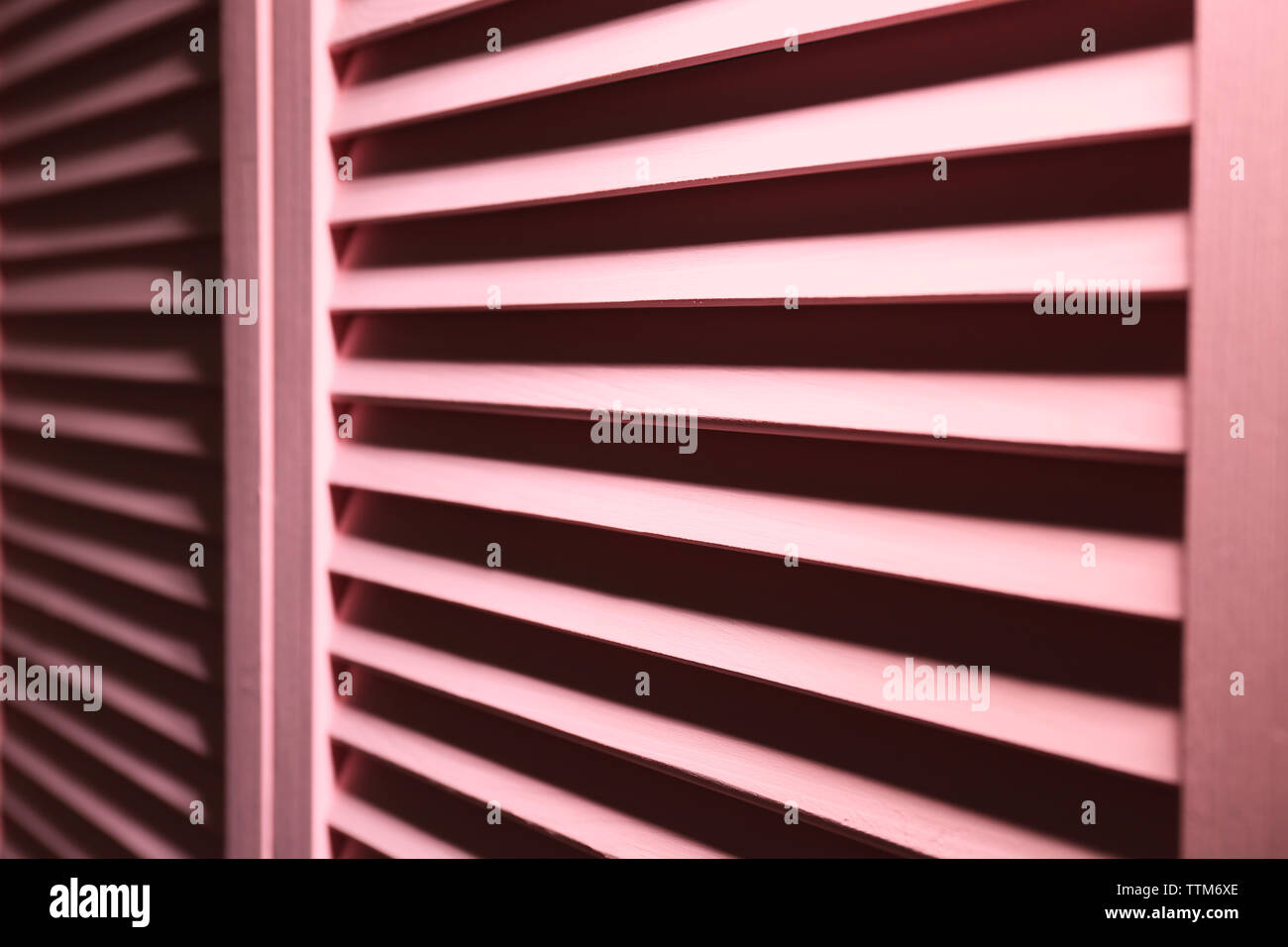 Pink folding screen, closeup Stock Photo - Alamy
