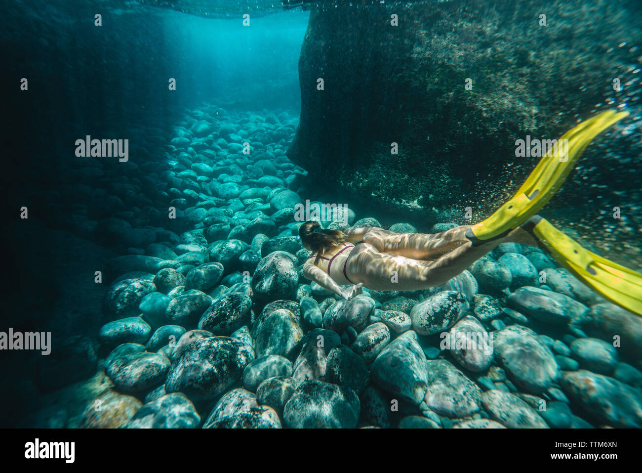 Woman diving into water hi-res stock photography and images - Alamy