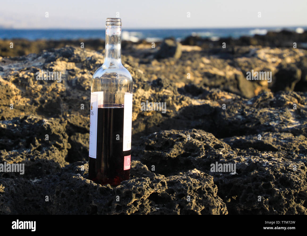 Empty bottle alcohol on beach hi-res stock photography and images - Alamy