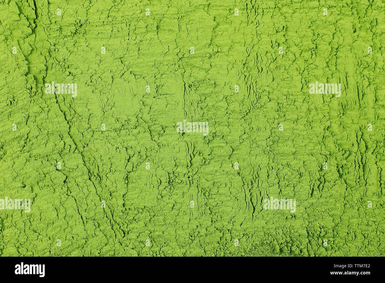 Powdered matcha green tea background, closeup Stock Photo - Alamy