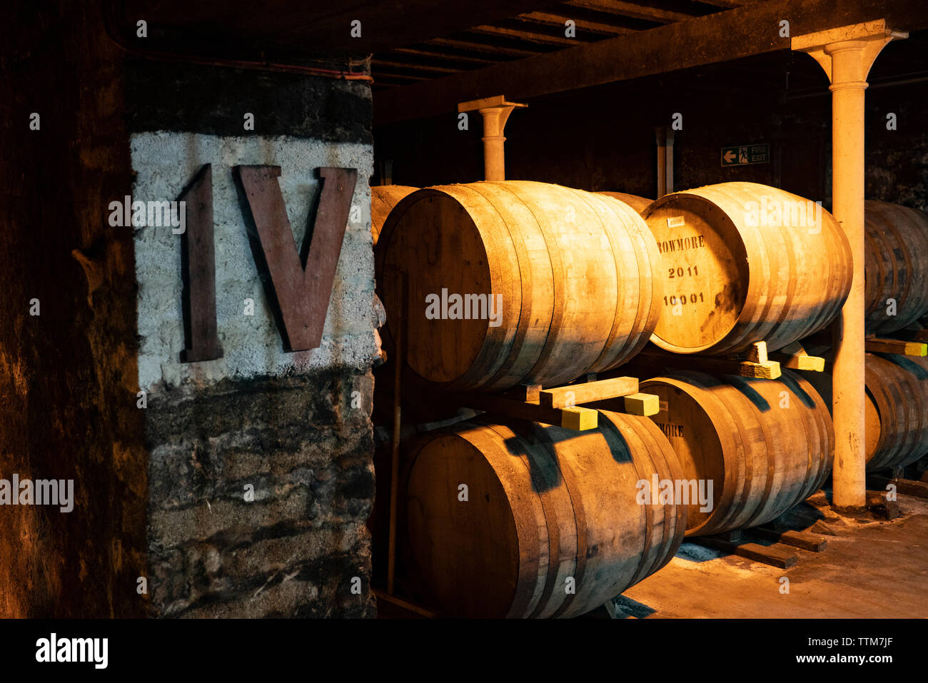 View of scotch whisky barrels in warehouse at Bowmore Distillery on ...