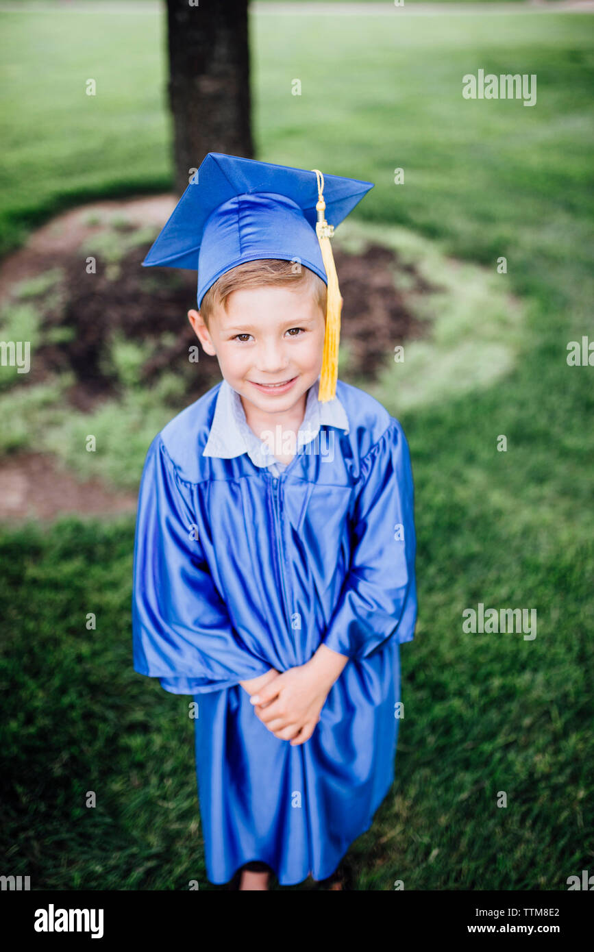 Portrait boy in graduation gown hi-res stock photography and images - Alamy