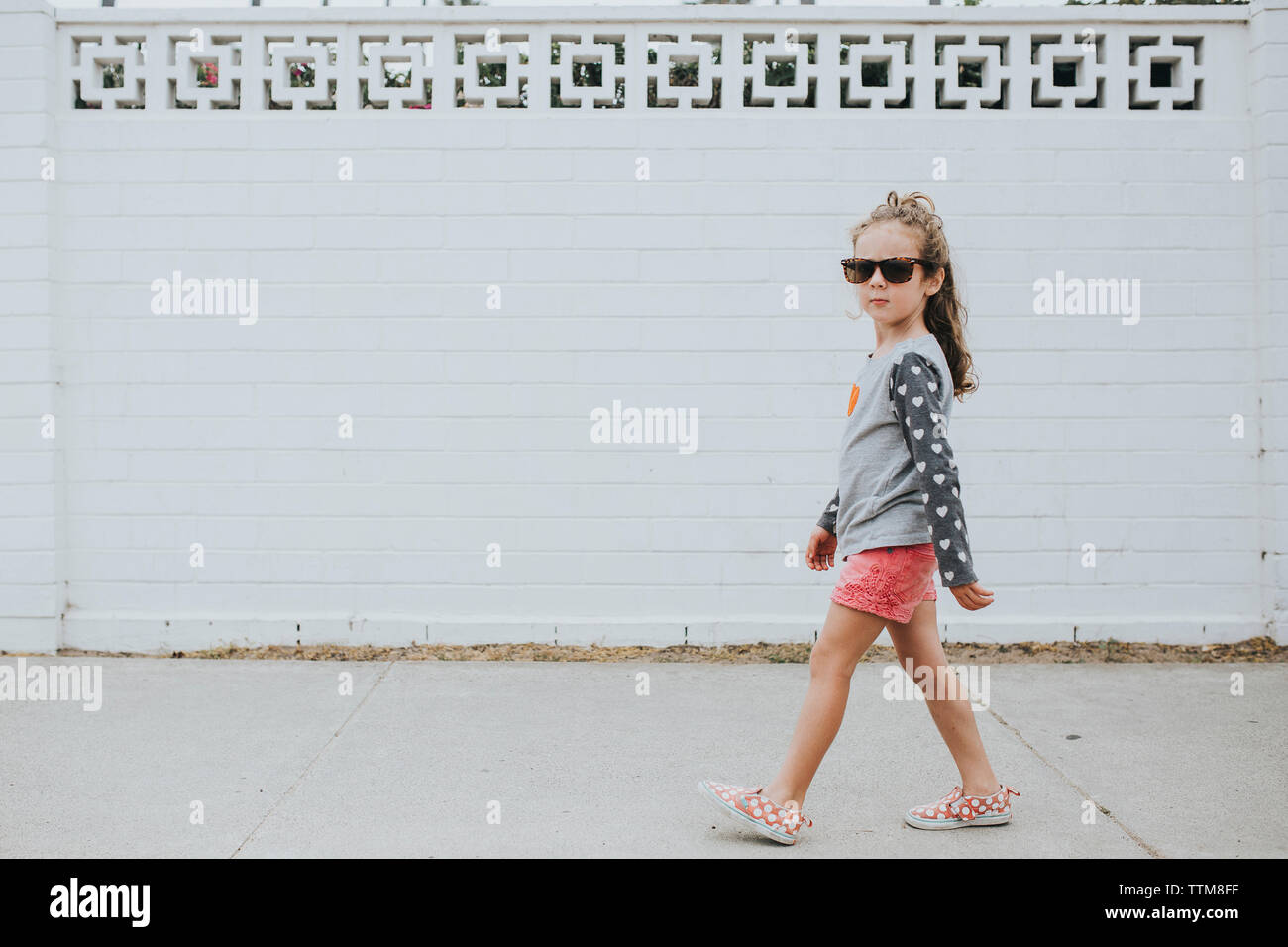 Girl walking footpath childhood hi-res stock photography and images - Alamy