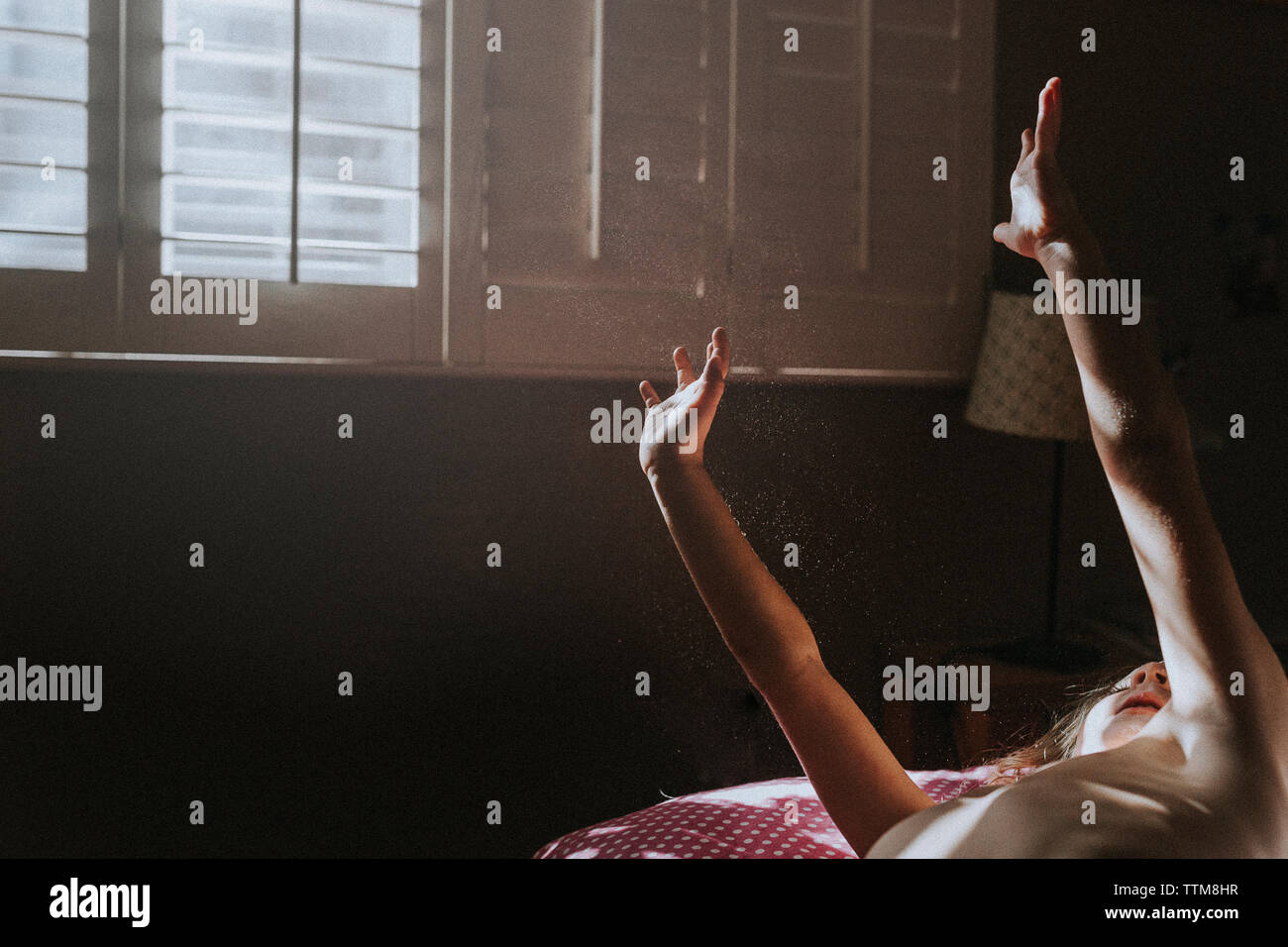 Person lying down arms up hi-res stock photography and images - Alamy