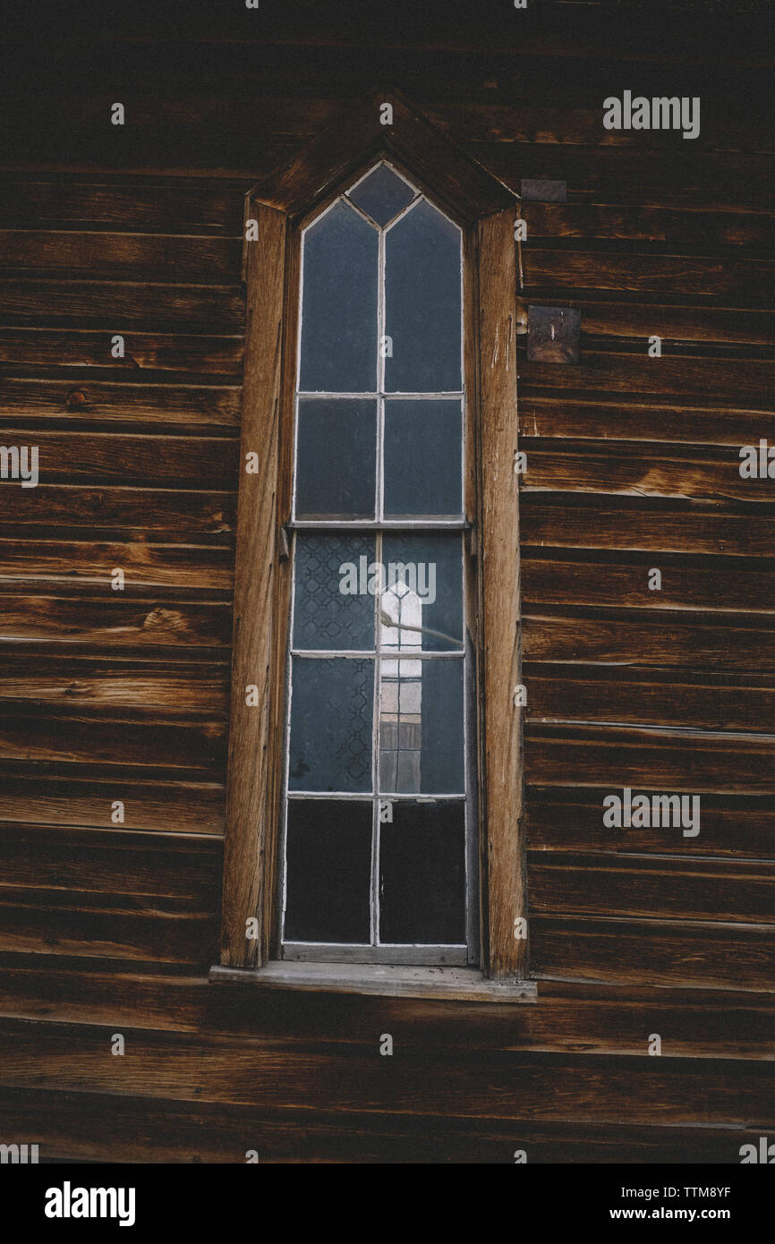 Close-up of log cabin window Stock Photo - Alamy