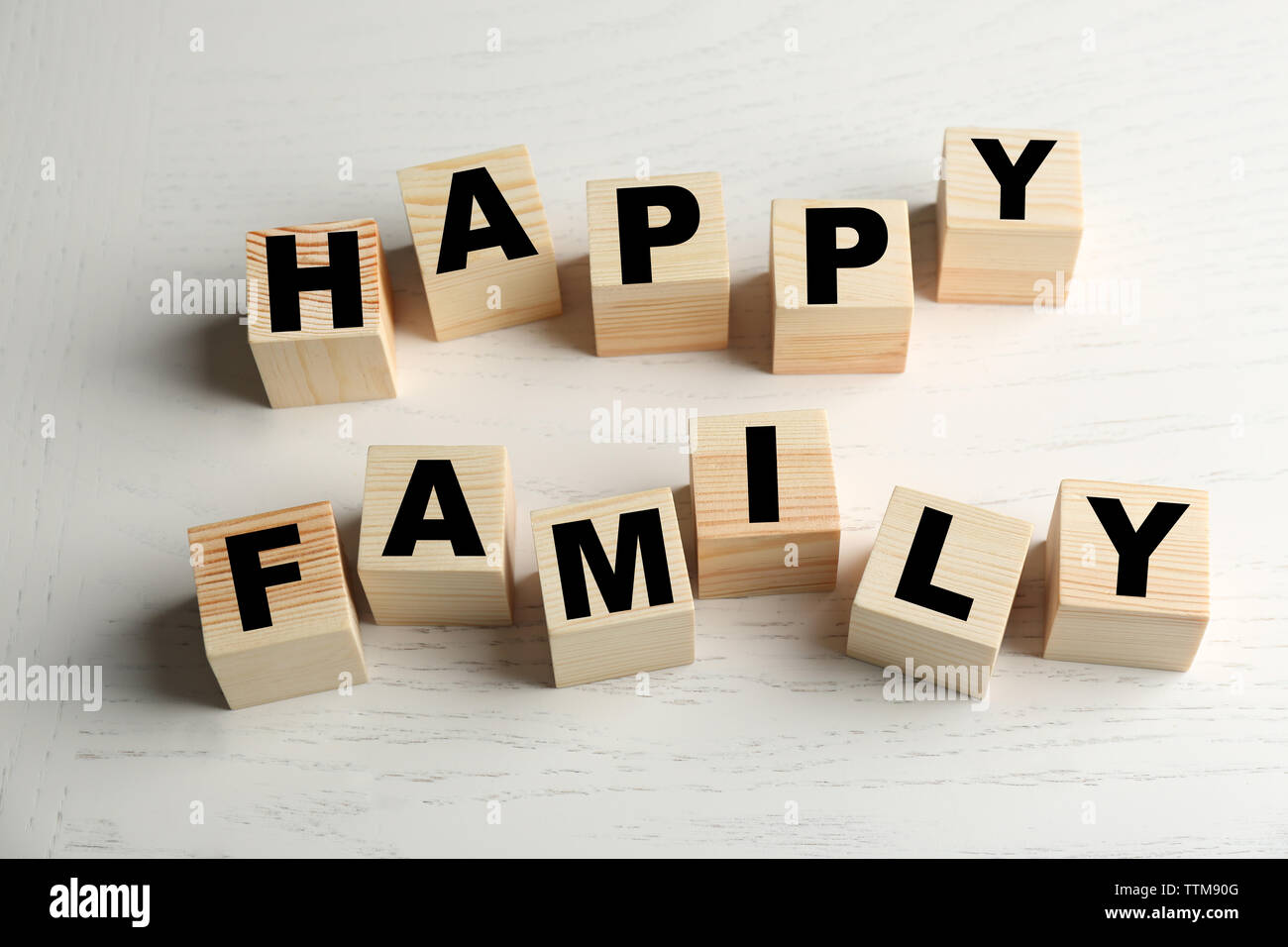 Words HAPPY FAMILY on light background Stock Photo - Alamy