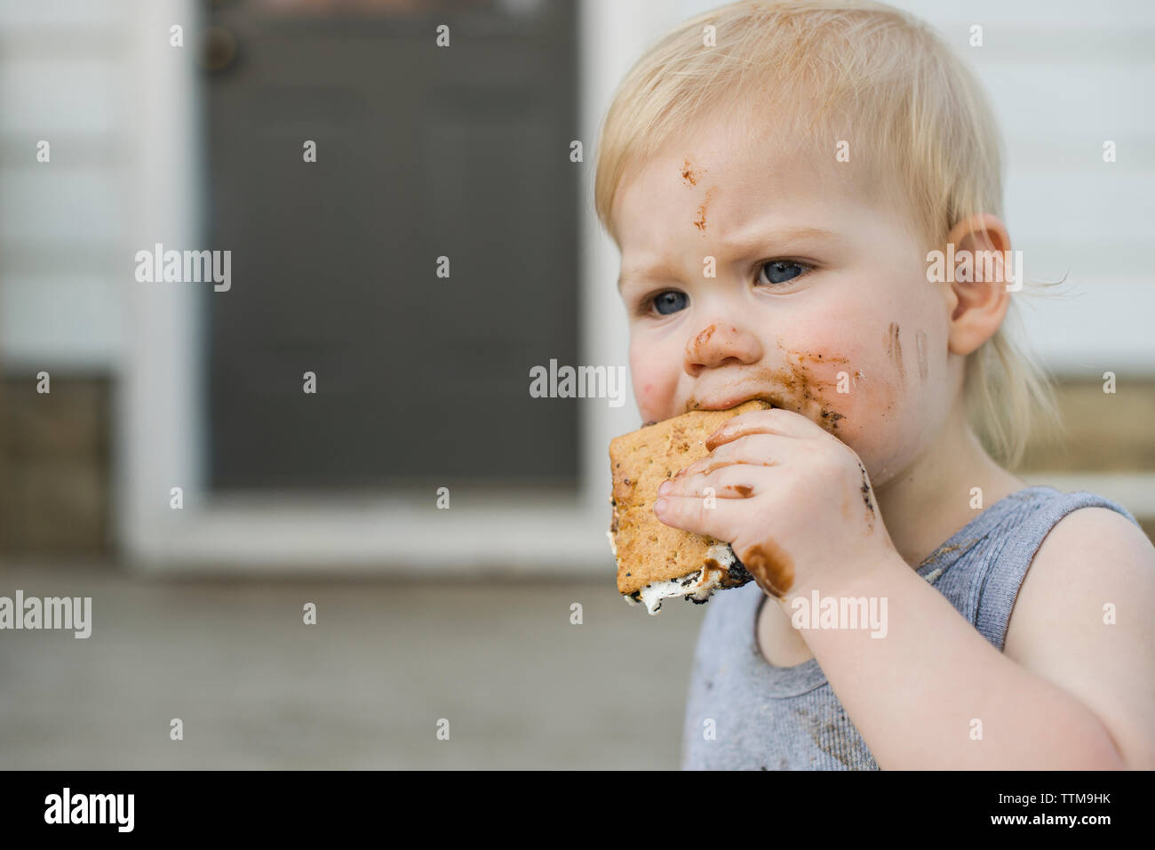 Boy eating chocolate messy hi-res stock photography and images - Alamy