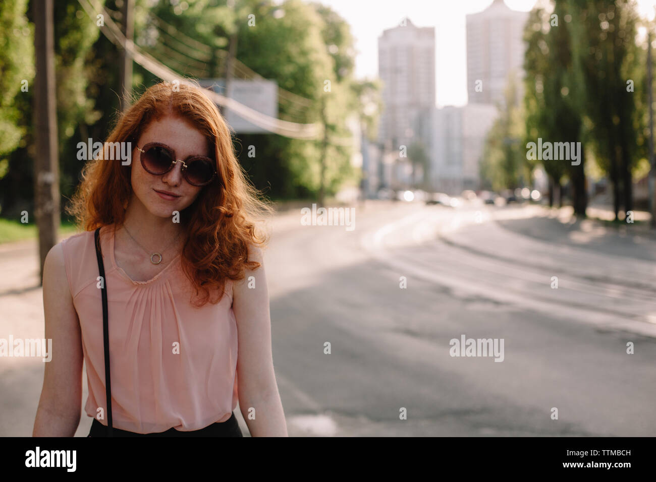 Redhead girl teenager standing front hi-res stock photography and ...