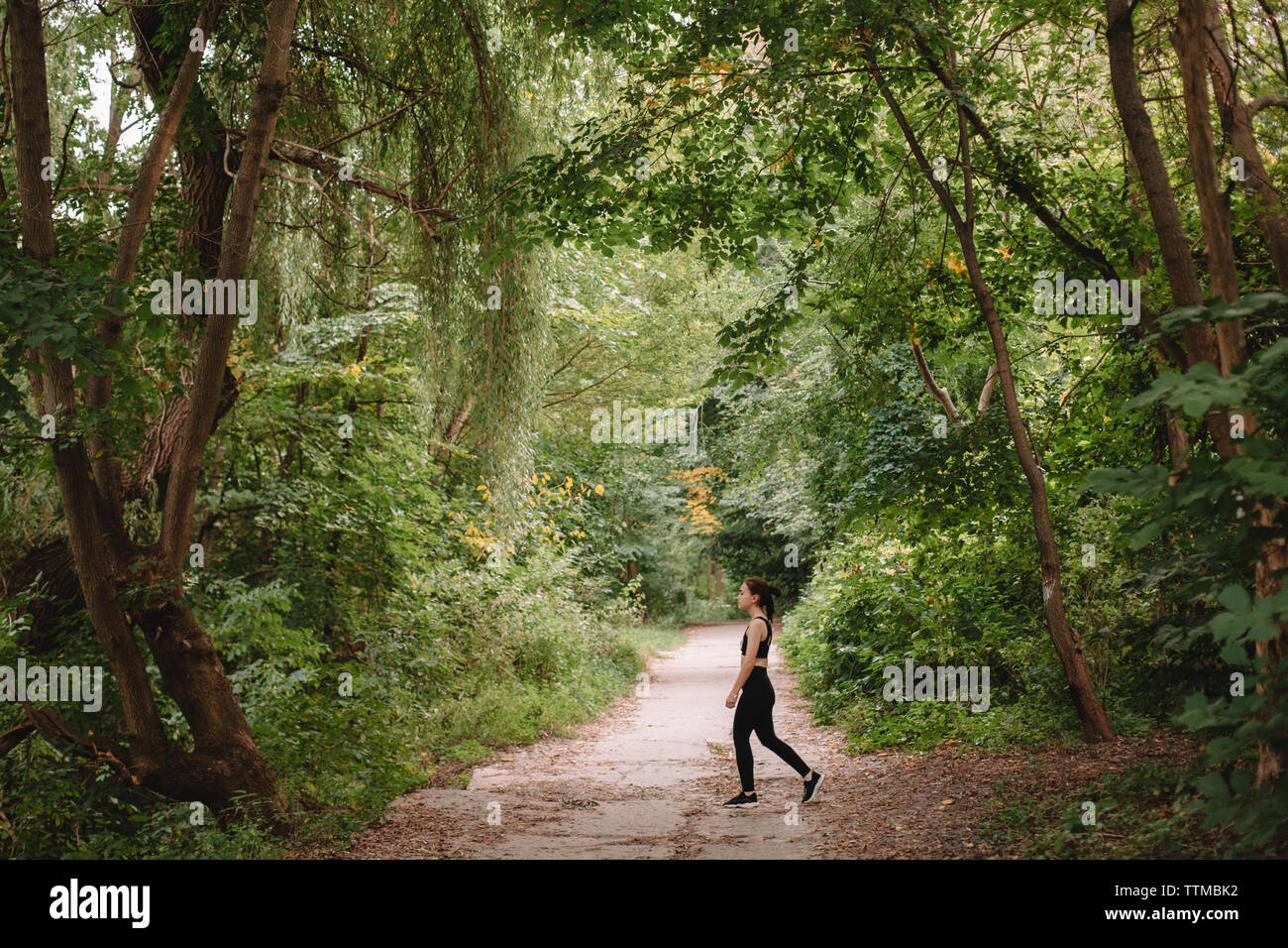 Full body walking profile hi-res stock photography and images - Alamy