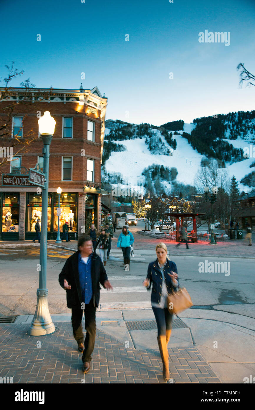 USA, Colorado, Aspen, people walk through the sqare in downtown Aspen ...