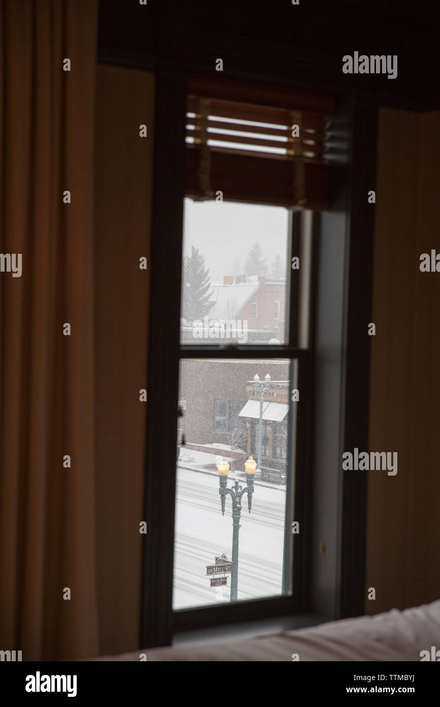 USA, Colorado, Aspen, view out of the hotel window on a snowy day, the ...
