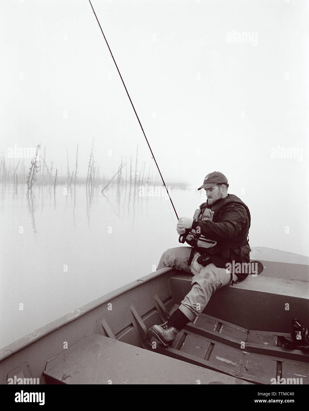 USA, Alaska, Redoubt Bay, man fishing on the South Fork of the Big ...