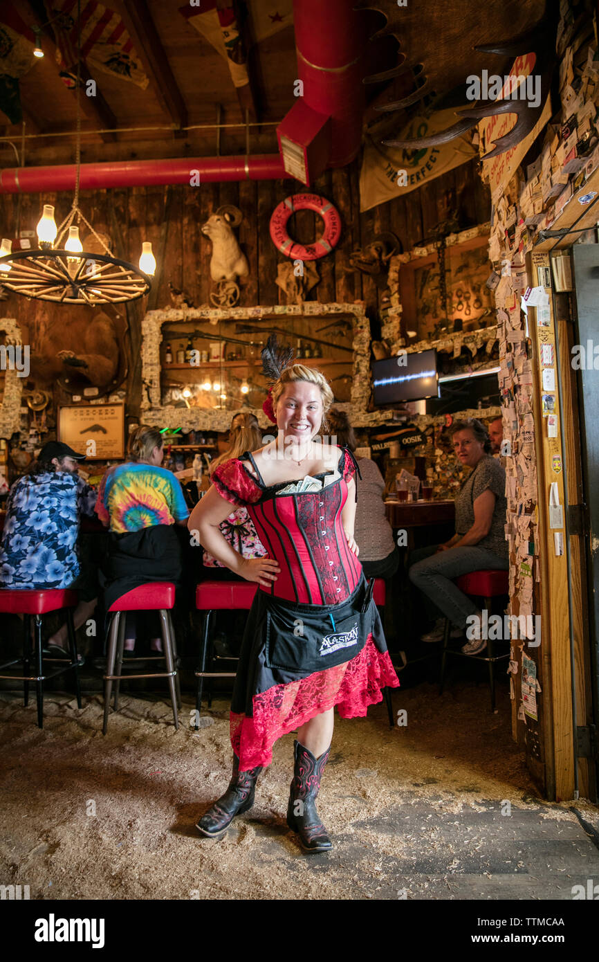 USA, Alaska, Juneau, Giselle, a waitresses at the Red Dog Saloon in ...