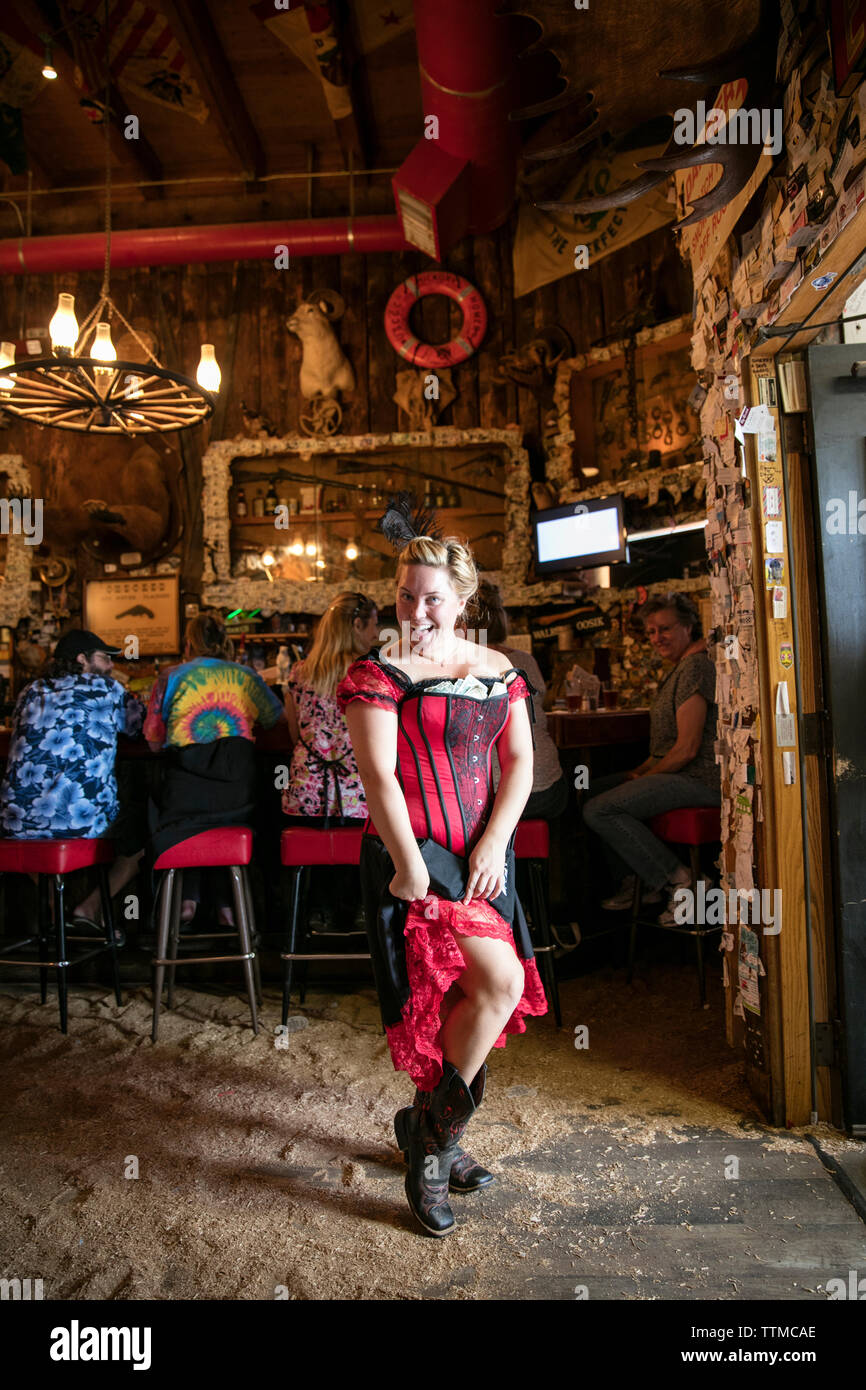 USA, Alaska, Juneau, Giselle, a waitresses at the Red Dog Saloon in ...