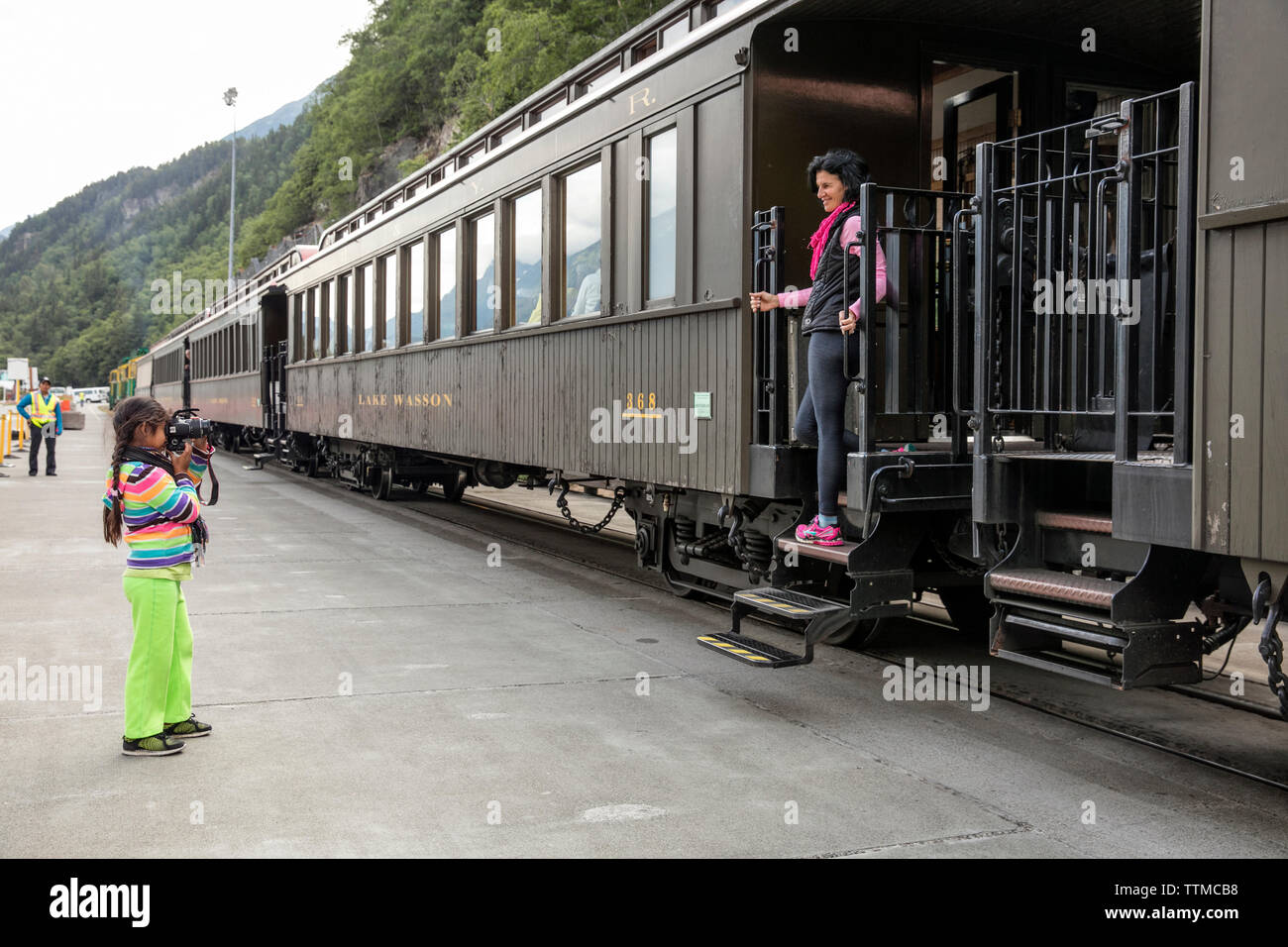 USA, Alaska, Sitka, passengers pose for pictures aboard the White Pass ...