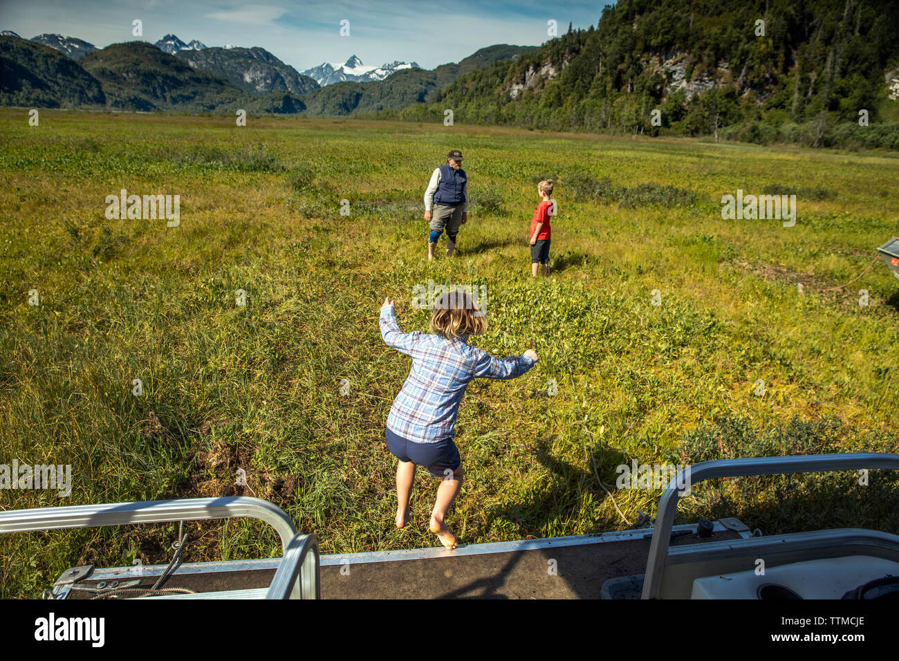 USA, Alaska, Redoubt Bay, Big River Lake, playing on the floating marsh ...