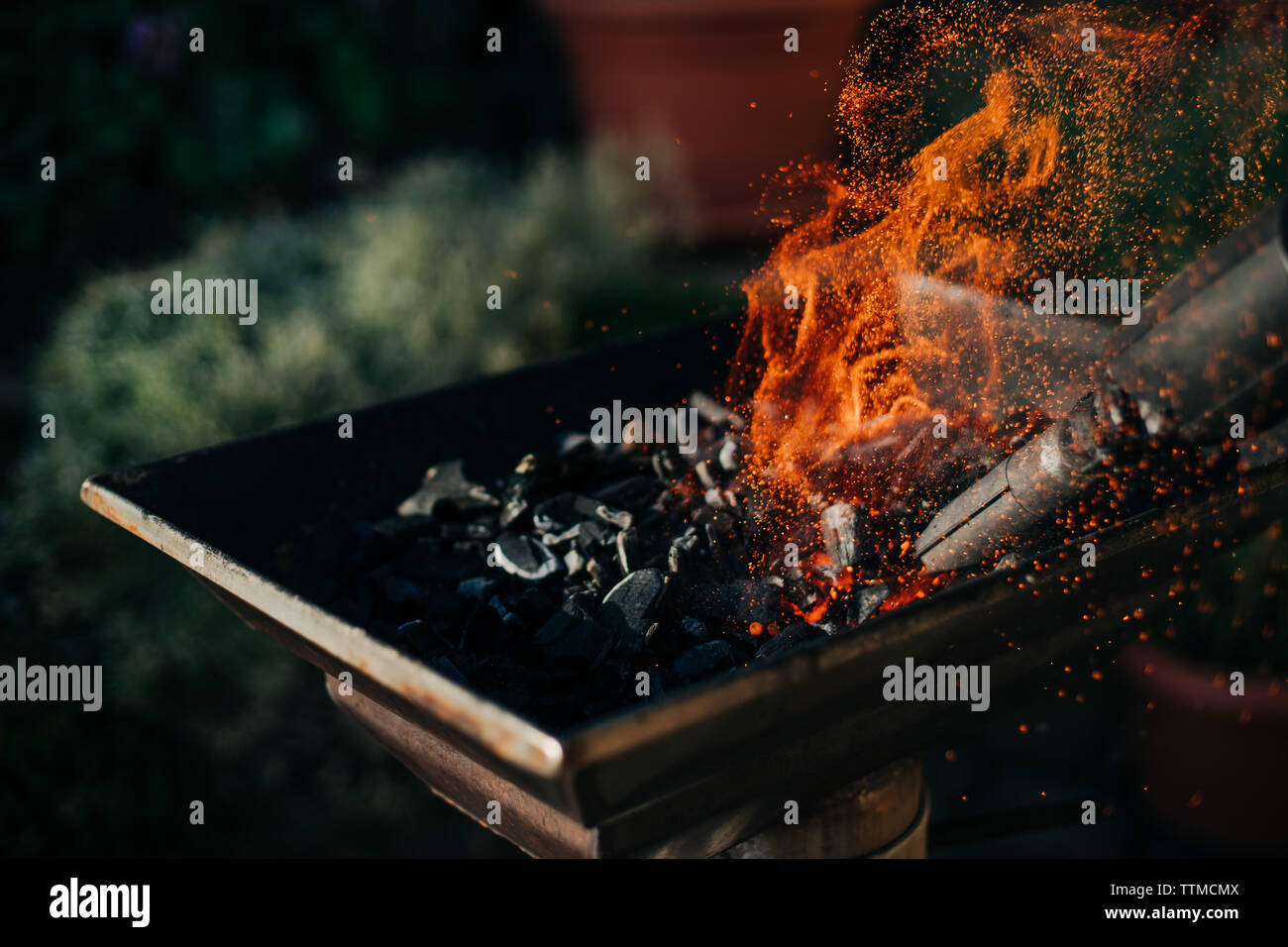 light up coal for barbecue Stock Photo - Alamy