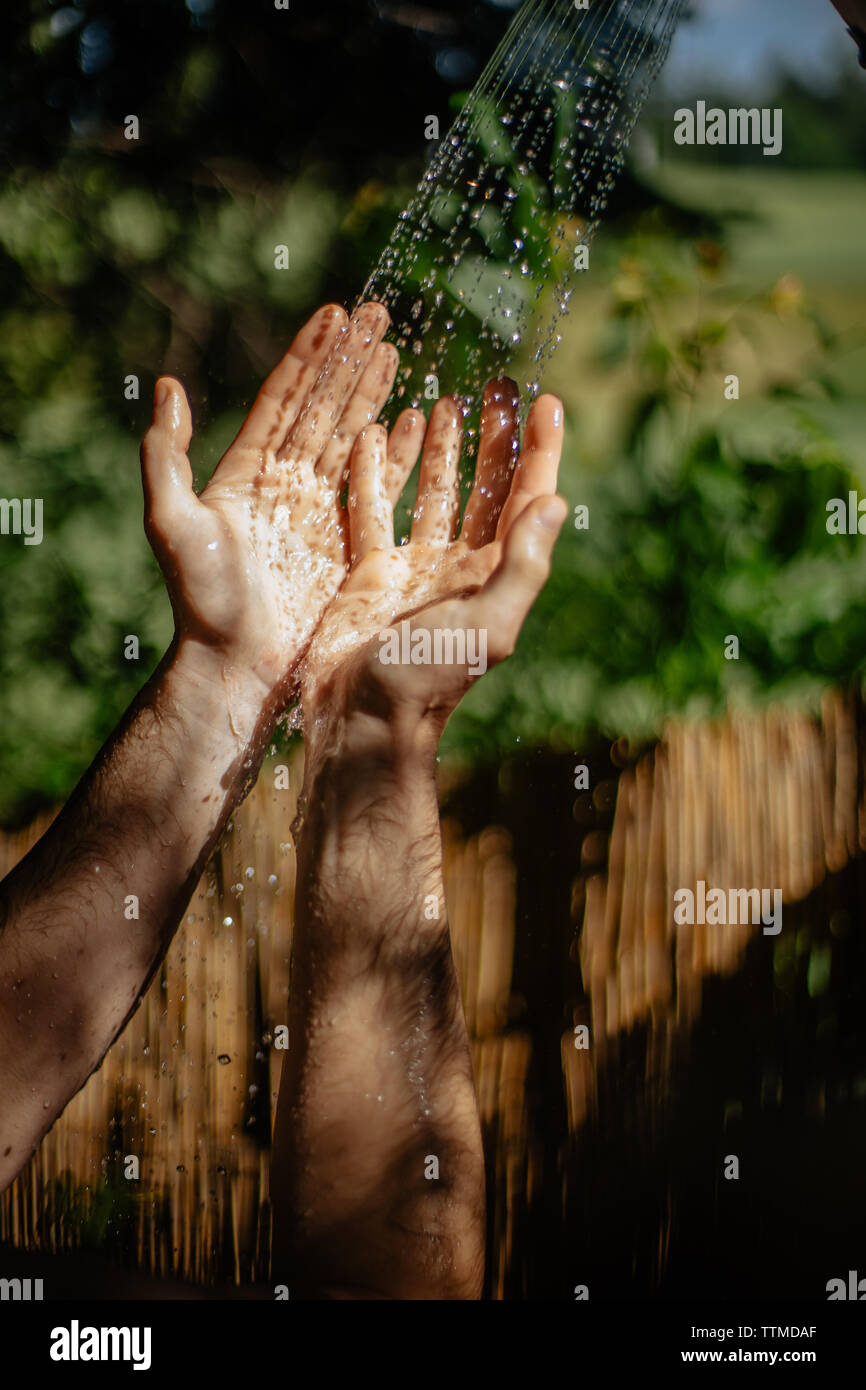 photo of human hand and splashing water Stock Photo - Alamy