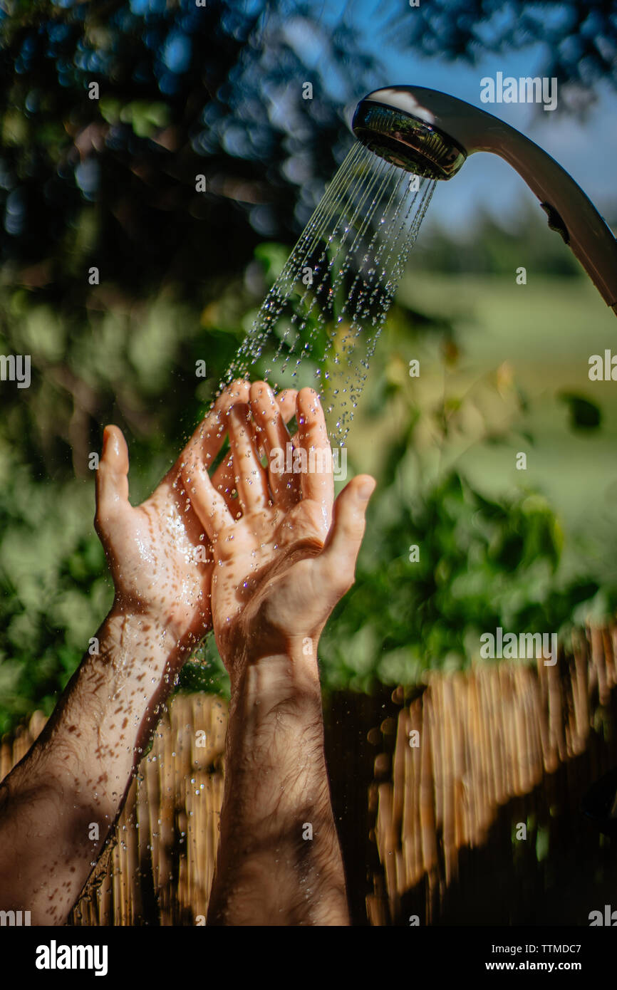 photo of human hand and splashing water Stock Photo - Alamy