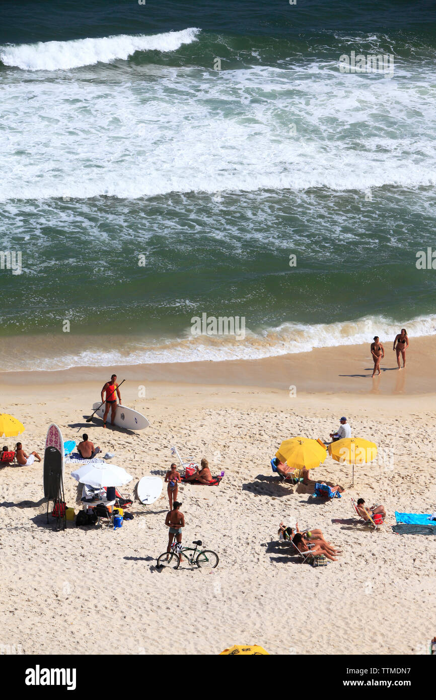 BRAZIL, Rio de Janiero, beach goers enjoy a sunny day at Ipanema Beach ...