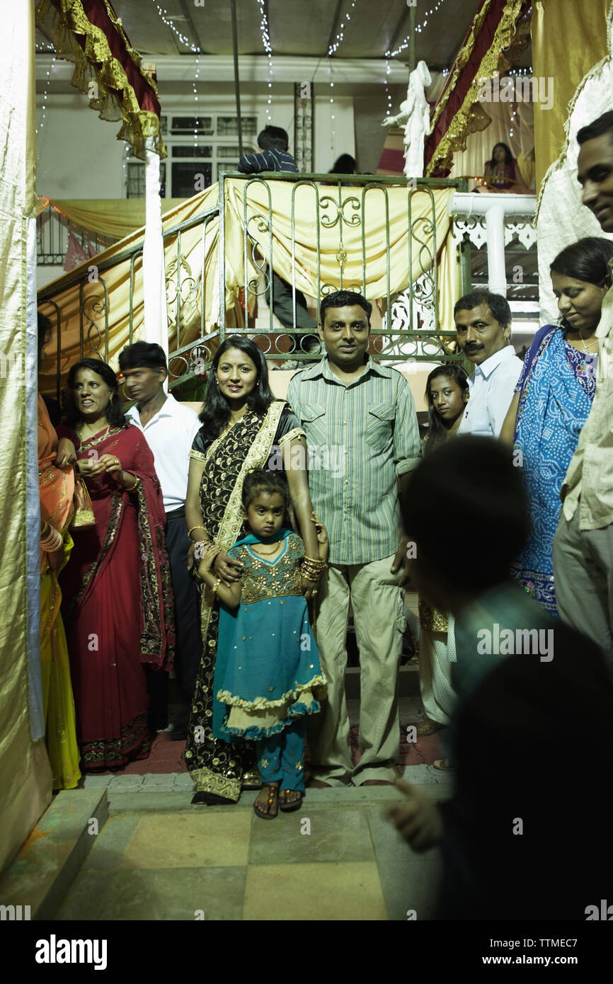 MAURITIUS, portrait of a family on the eve of an upscale Hindu wedding ...