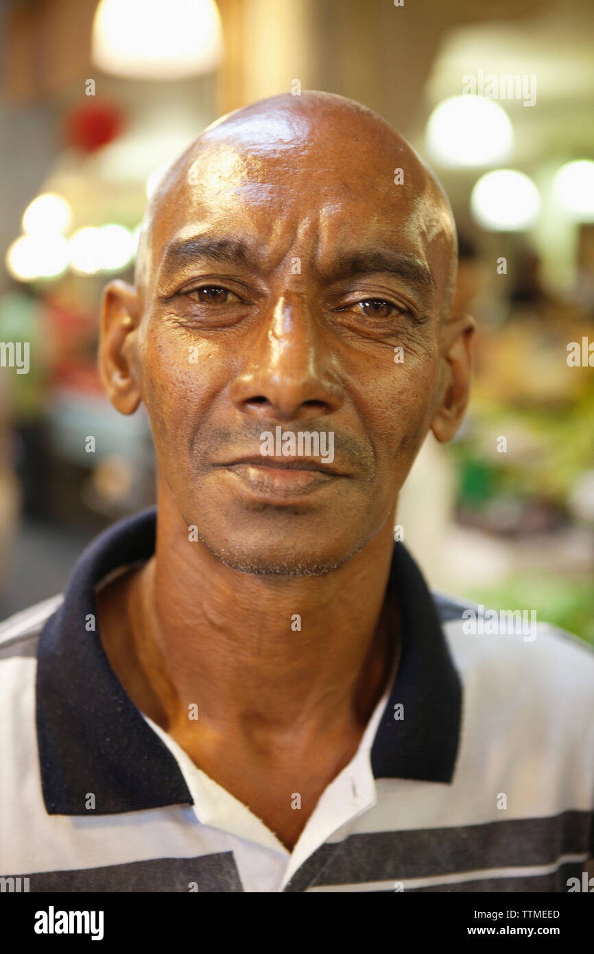 MAURITIUS; Port Louis; street portrait of a man at the Port Louis ...