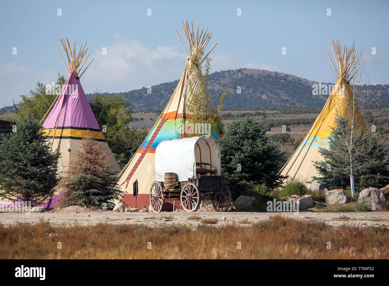 USA, Nevada, Wells, colorful tipis are scattered all over Mustang ...