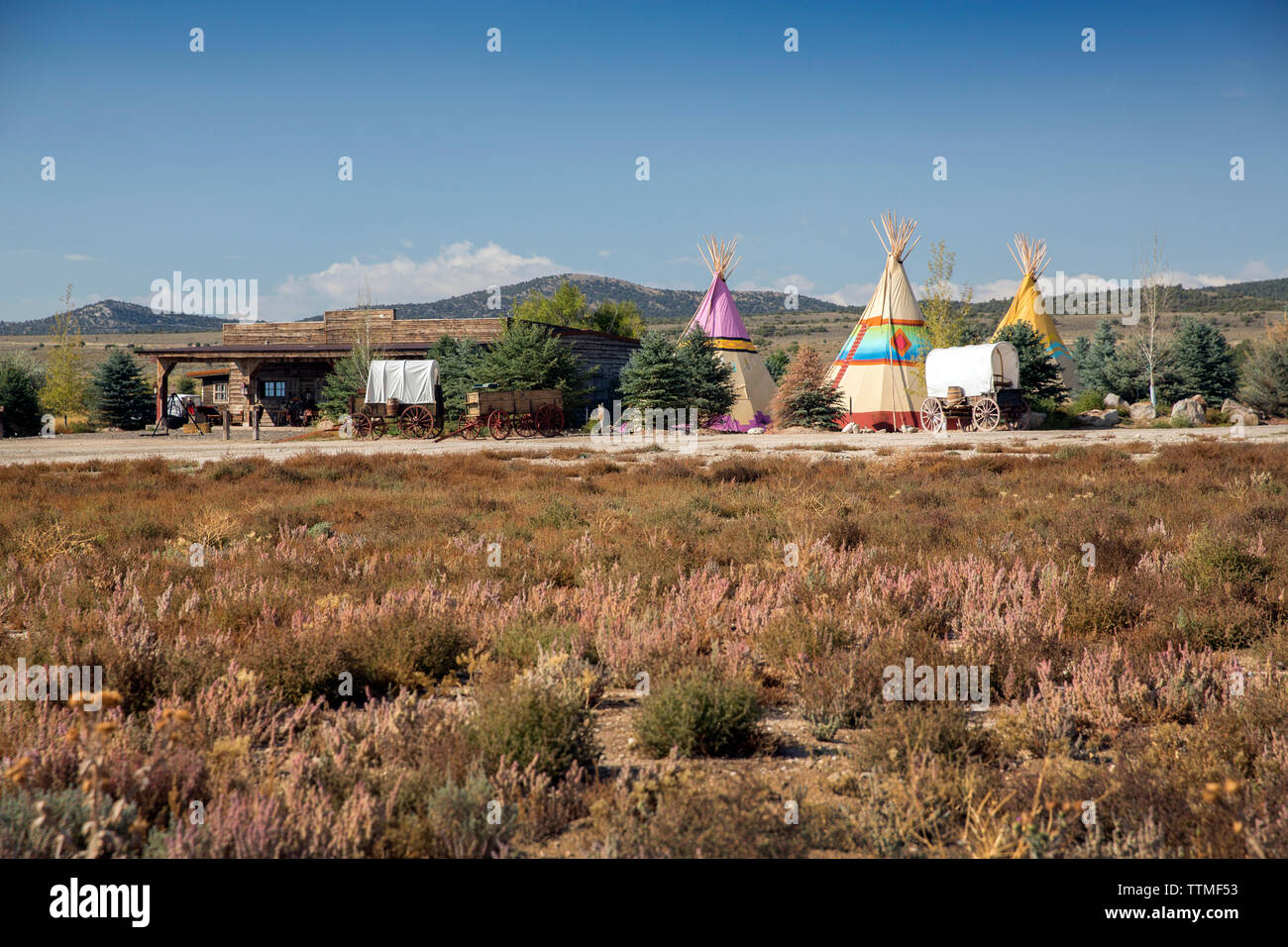 USA, Nevada, Wells, colorful tipis are scattered all over Mustang ...