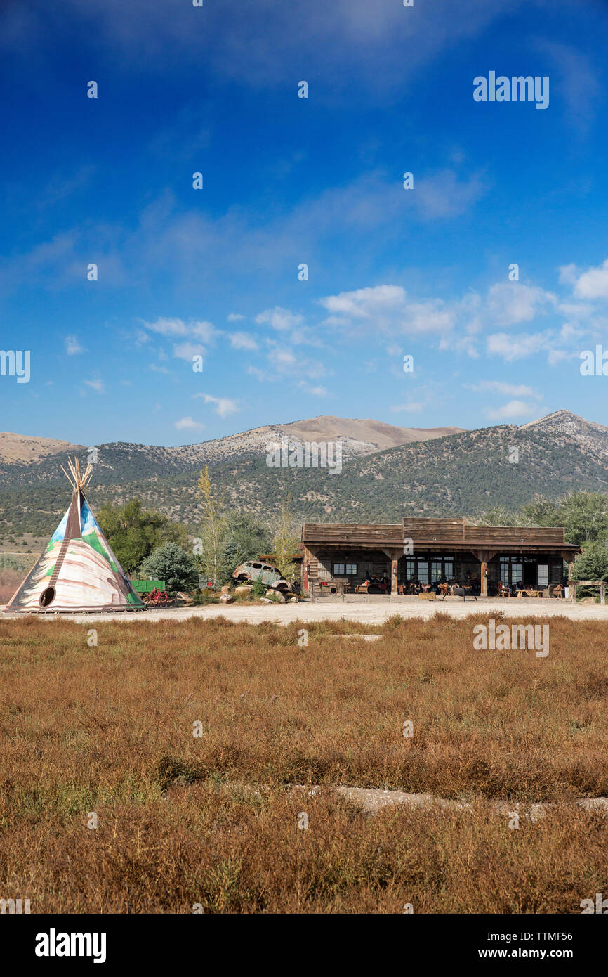 USA, Nevada, Wells, colorful tipis are scattered all over Mustang ...