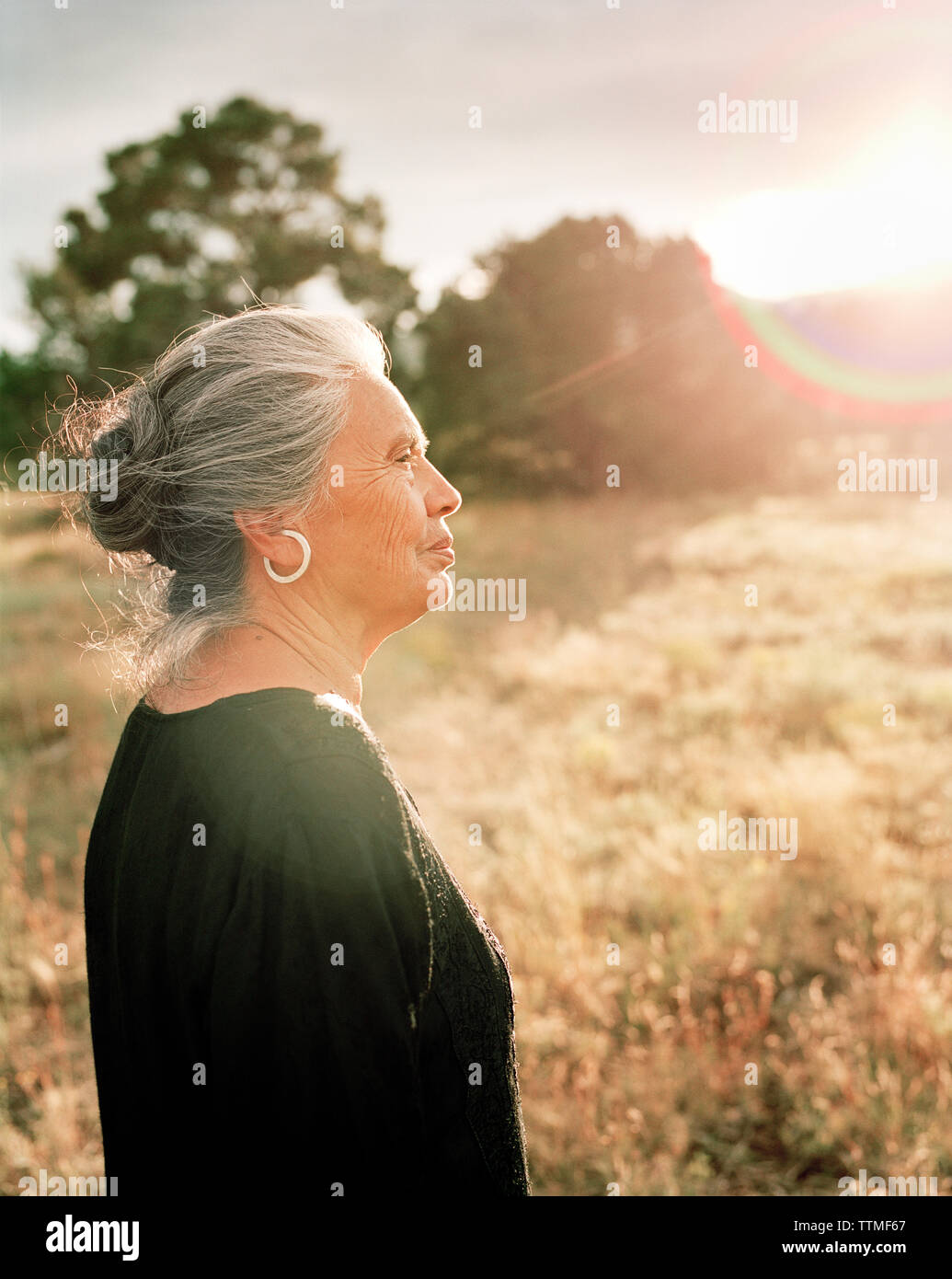 USA, New Mexico, beautiful Native American woman at sunset, Valley of ...