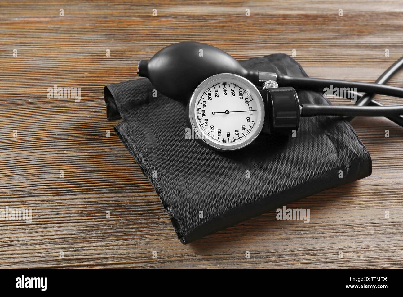 Medical manometer on a wooden background Stock Photo - Alamy