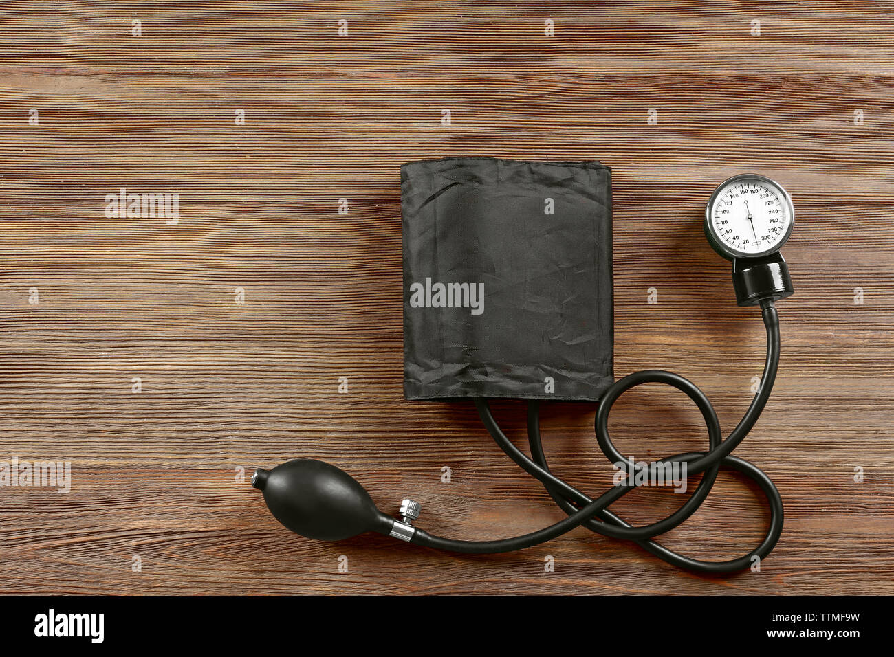 Medical manometer on a wooden background Stock Photo - Alamy