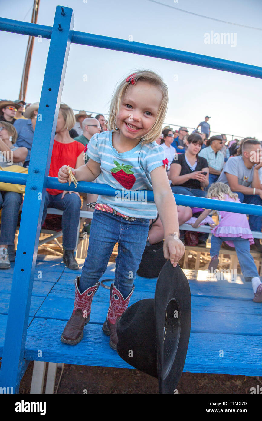 USA, Oregon, Sisters, Sisters Rodeo, children watching the events at ...