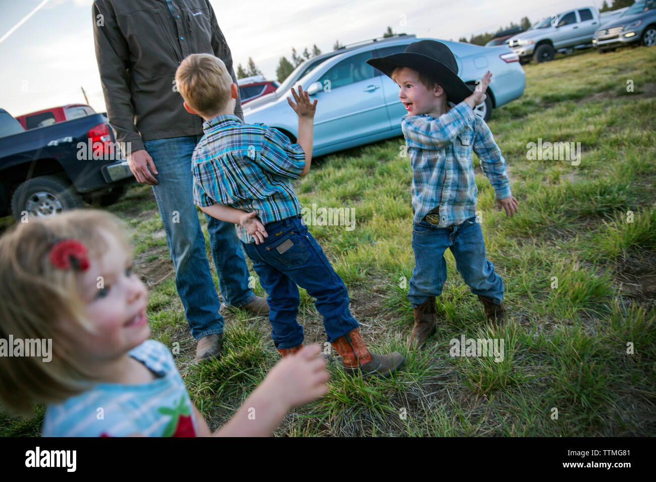 USA, Oregon, Sisters, Sisters Rodeo, children playing on the grounds of ...