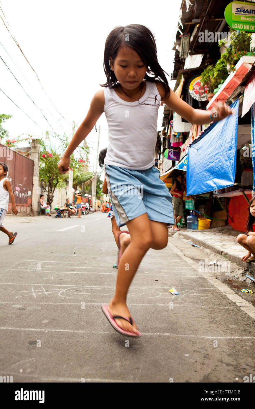 Philippines children jumping hi-res stock photography and images - Alamy
