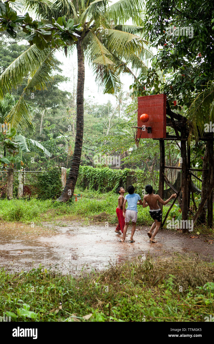 PHILIPPINES, Palawan, Puerto Princesa, Ian, Marvin and Nestor play ...